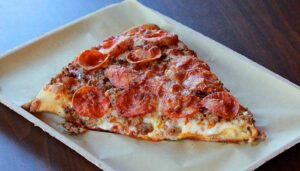 Pizza Beloit WI | Pizza by the Slice | Downtown Den Tavern & Pizza