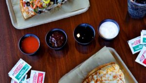 Pizza Beloit WI | Pizza by the Slice | Downtown Den Tavern & Pizza