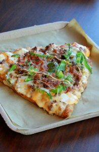 Downtown Den Tavern & Pizza | Pizza by the Slice in Beloit WI